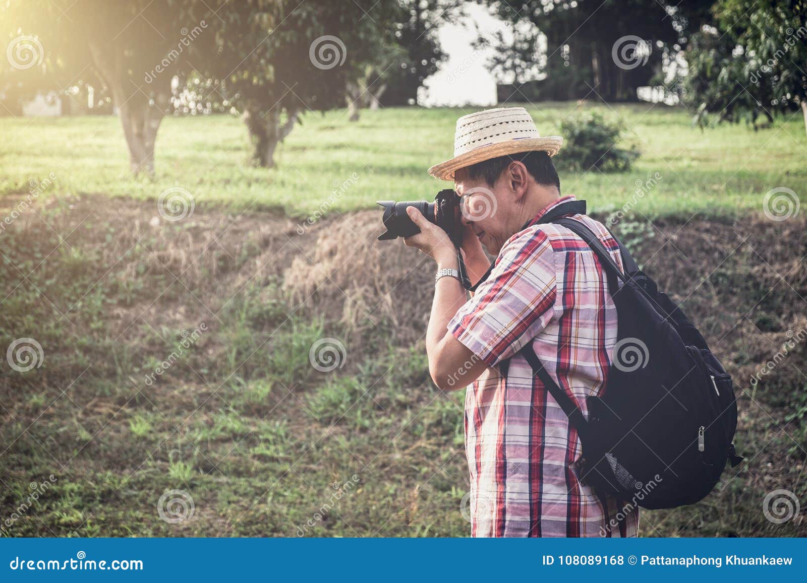 Older Man Backpacking Travel are Taking Photo Stock Photo - Image of ...