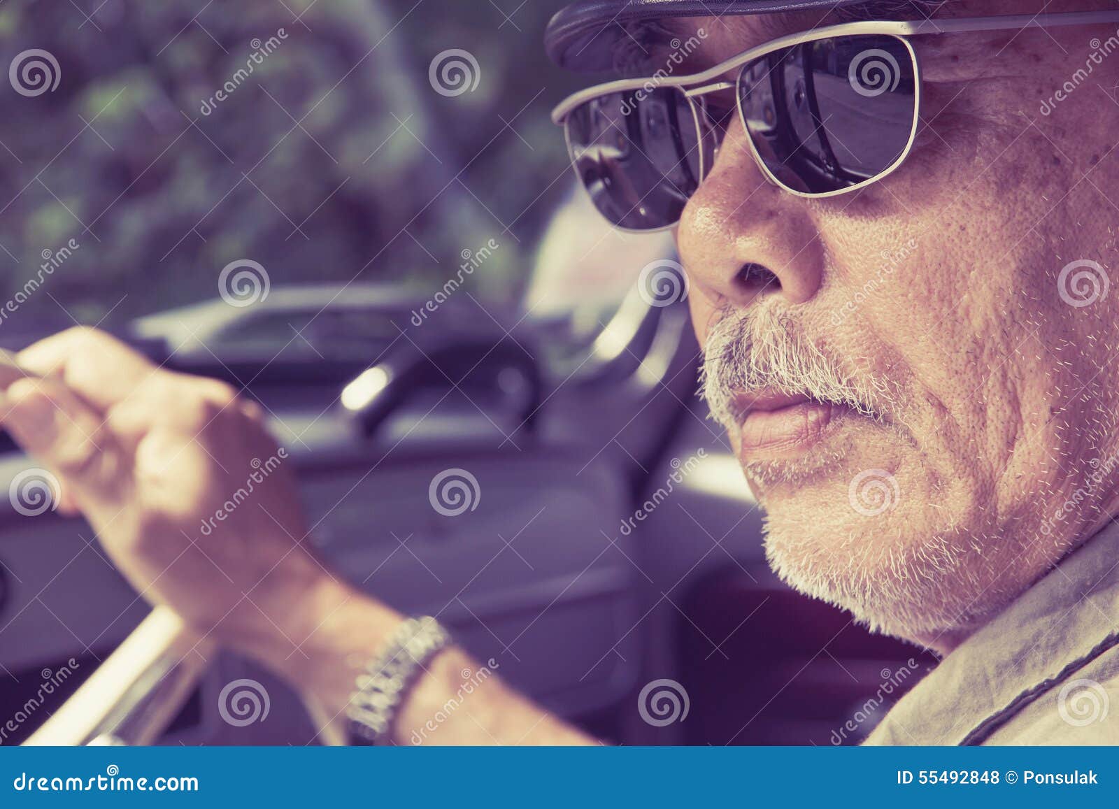 Older man driving a car stock photo. Image of vehicle - 55492848