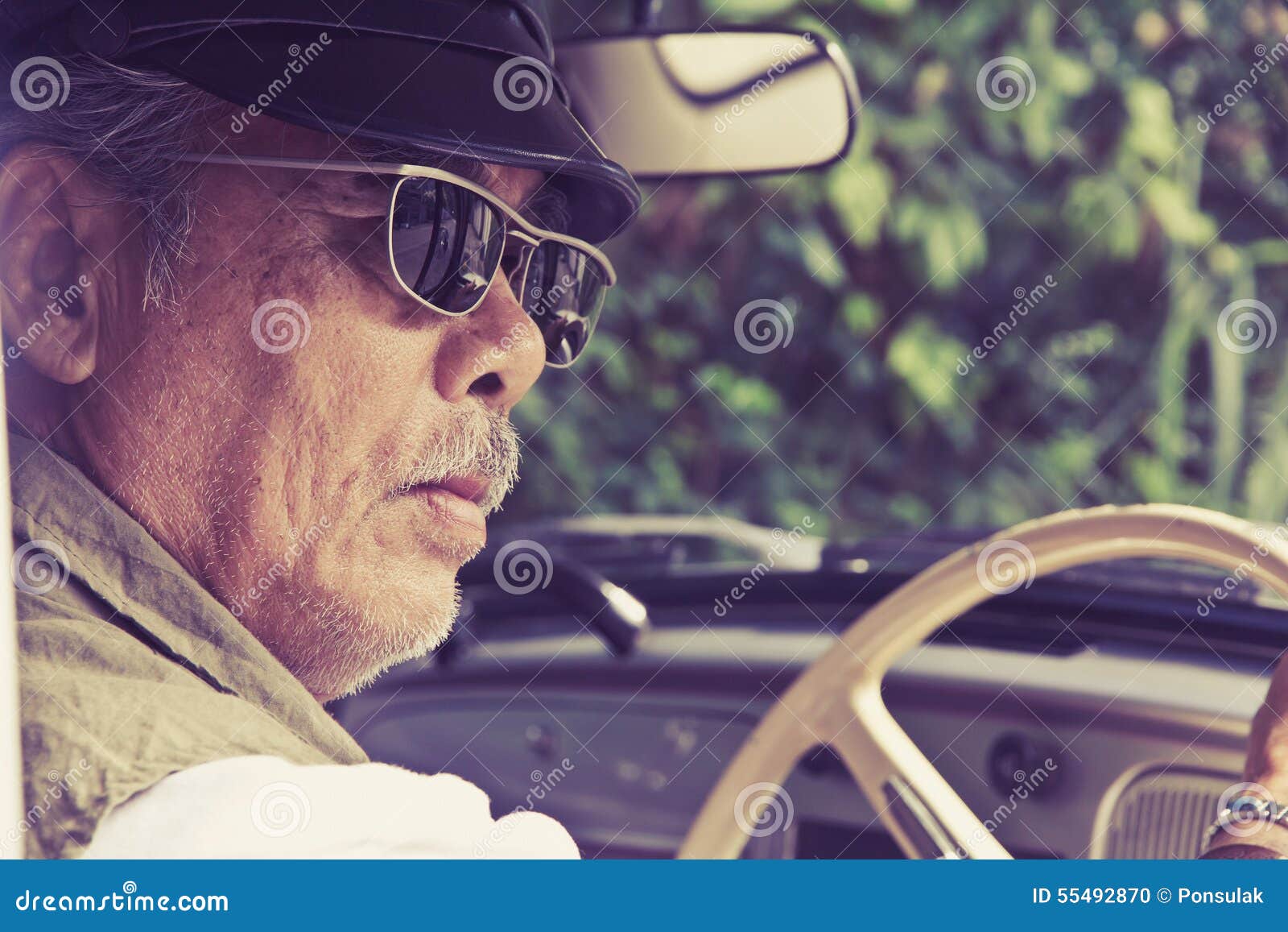 Older man driving a car stock photo. Image of serious - 55492870