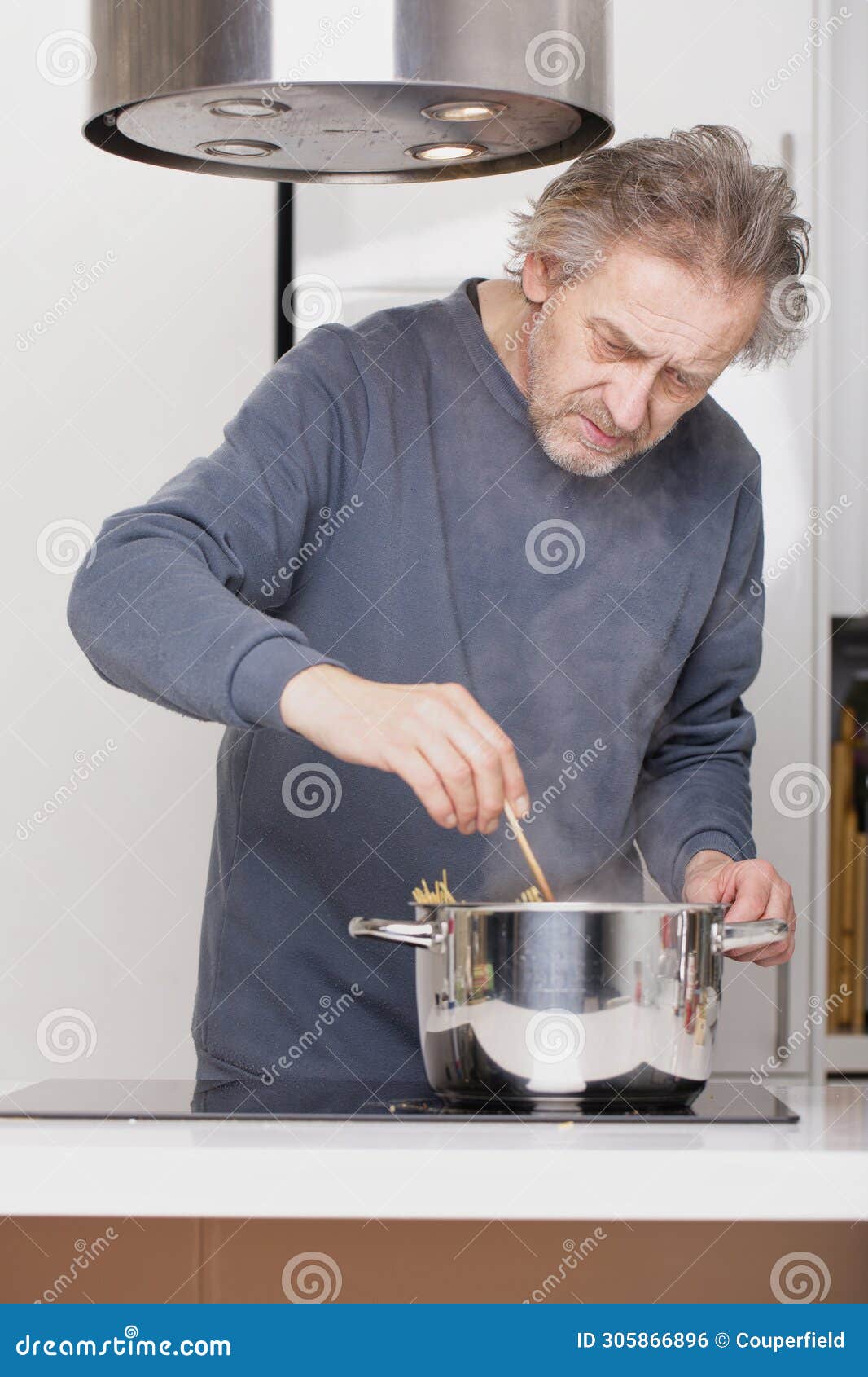 Boiling Spaghetti in Pot on Kitchen Hob for Lunch or Dinner of Older ...