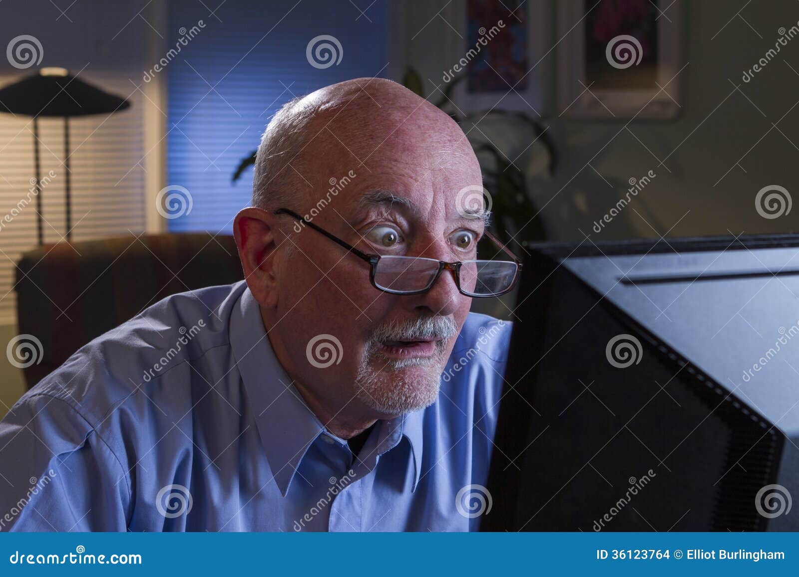 Older Man Shocked with Content on His Computer, Horizontal Stock Photo ...