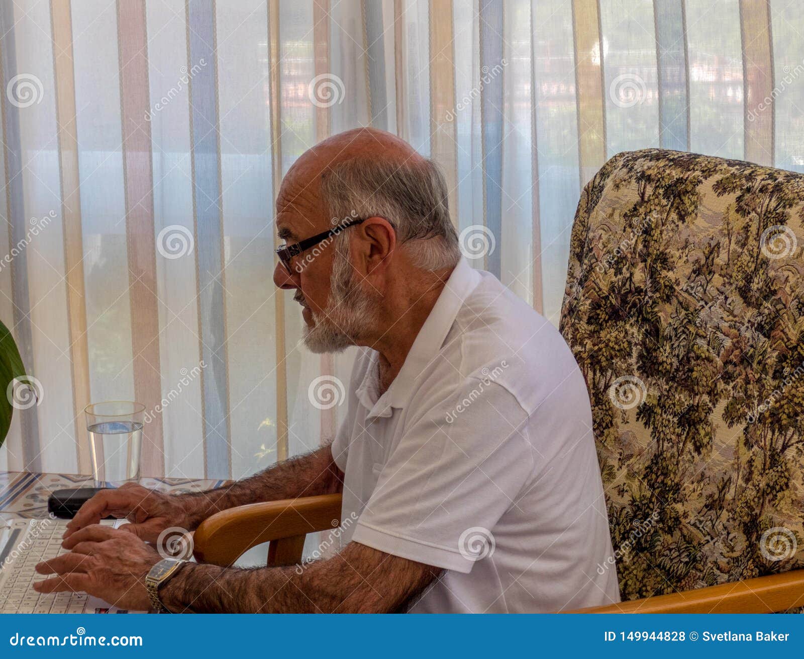Older man typing on laptop stock photo. Image of male - 149944828