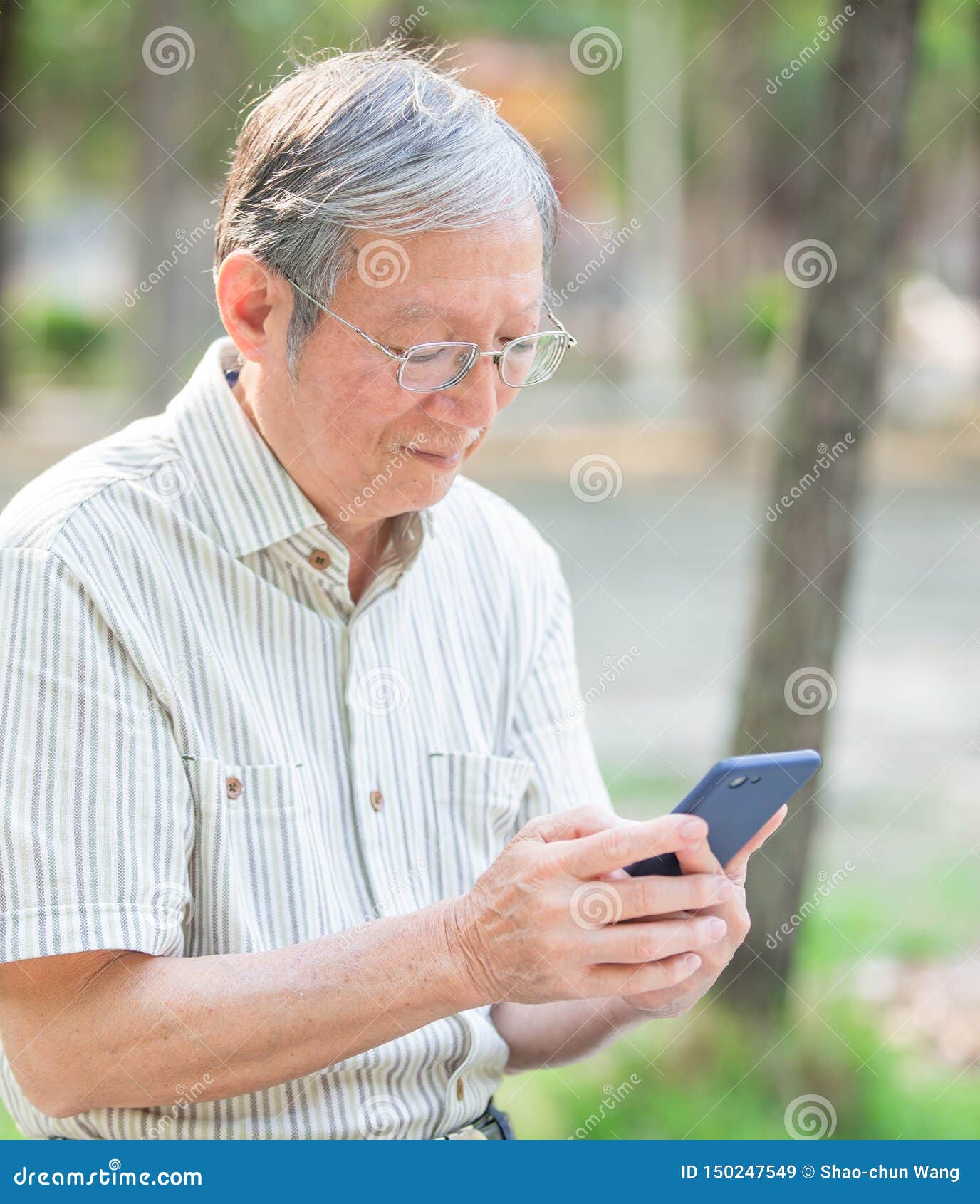 Older man use cellphone stock image. Image of older - 150247549