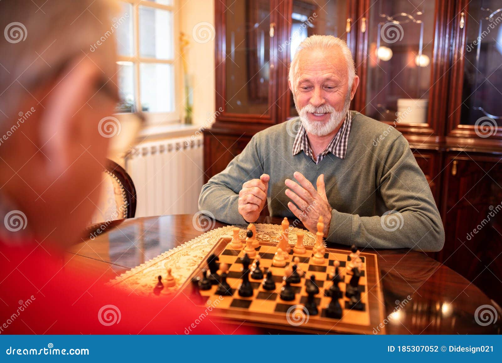 Older Men Playing a Game of Chess Stock Photo - Image of background ...