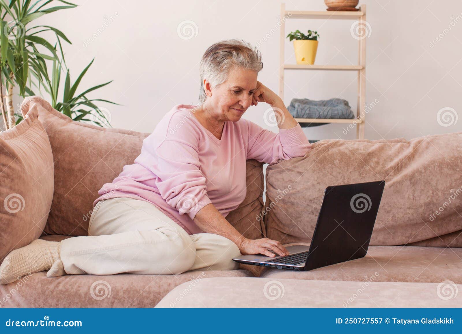 Older Smiling 60s Woman Sitting at Home on Sofa Stock Image - Image of ... Older Smiling 60s Woman Sitting at Home on Sofa Stock Image - Image of ...