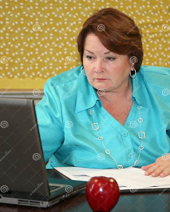 Older Teacher Staring at Her Computer Stock Image - Image of adult ...