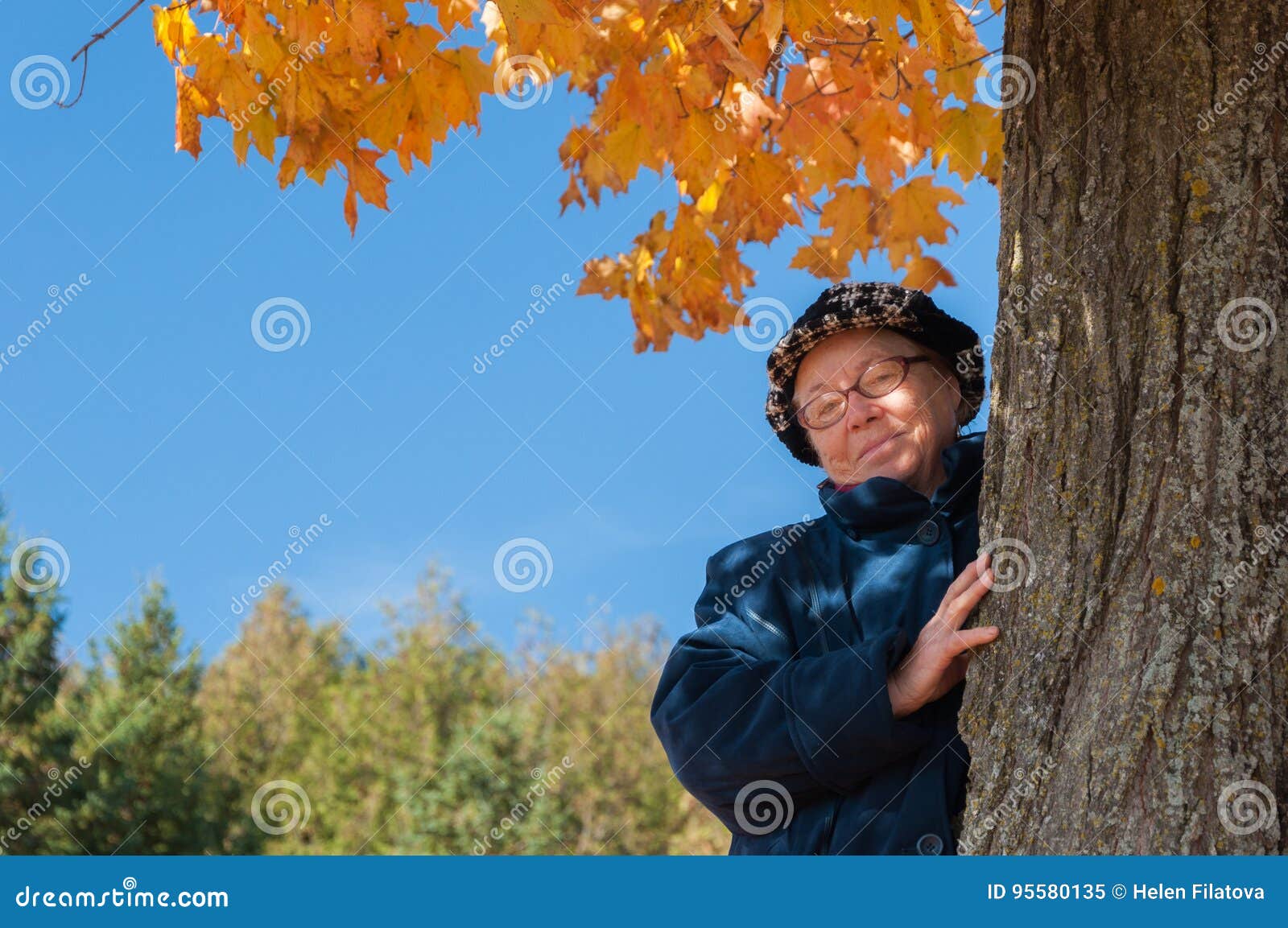 Older woman in fall stock image. Image of horizontal - 95580135