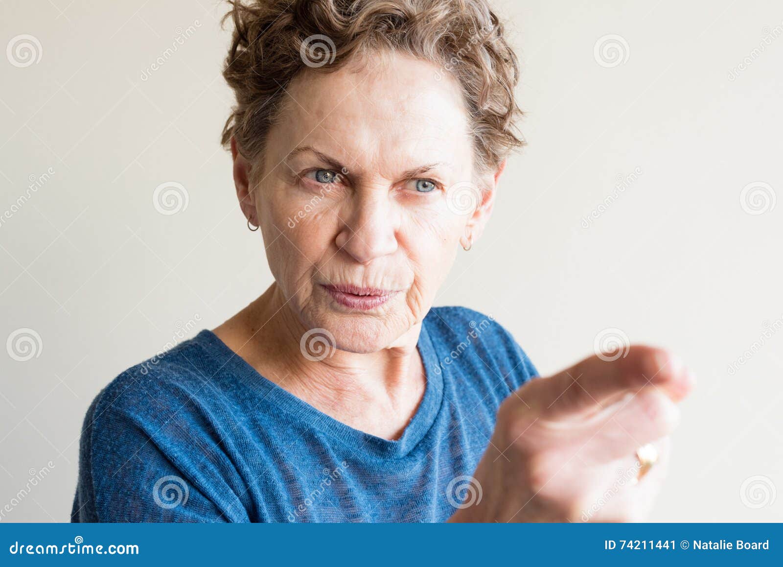 Older Woman Pointing Finger Stock Image - Image of shoulders, woman ...