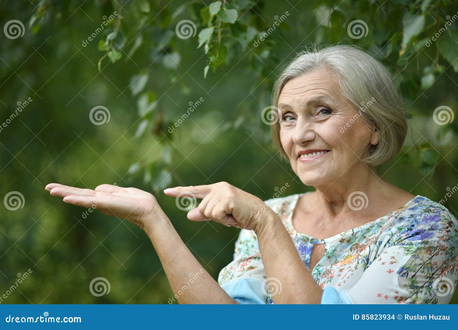 Older woman pointing stock photo. Image of offer, friendly - 85823934