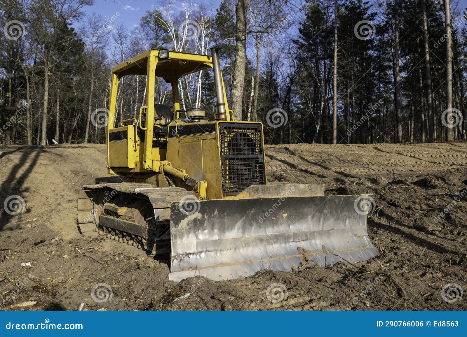 Older Working Bulldozer on a New Home Construction Building Site Stock ...
