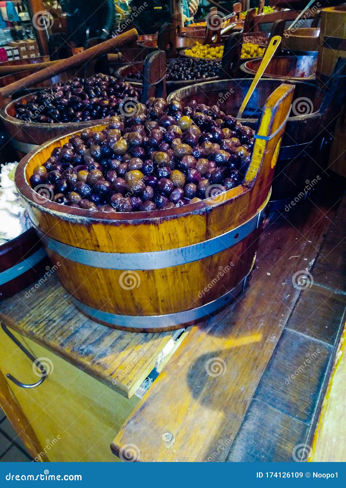 Olive Display in Rustic Barrels with Spoons Stock Image - Image of ...