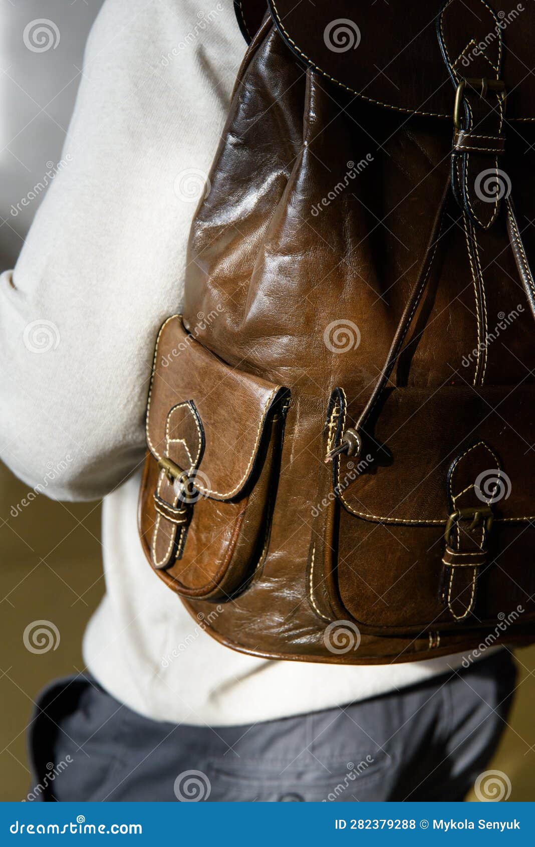 Olive Leather Oldfashioned Backpack on a Mans Back Stock Photo - Image ...