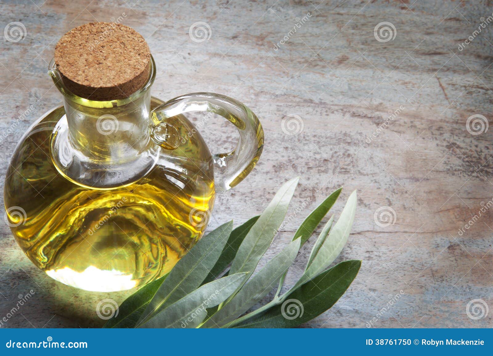 Olive Oil and Olive Leaves on Rustic Timber Stock Photo - Image of ...