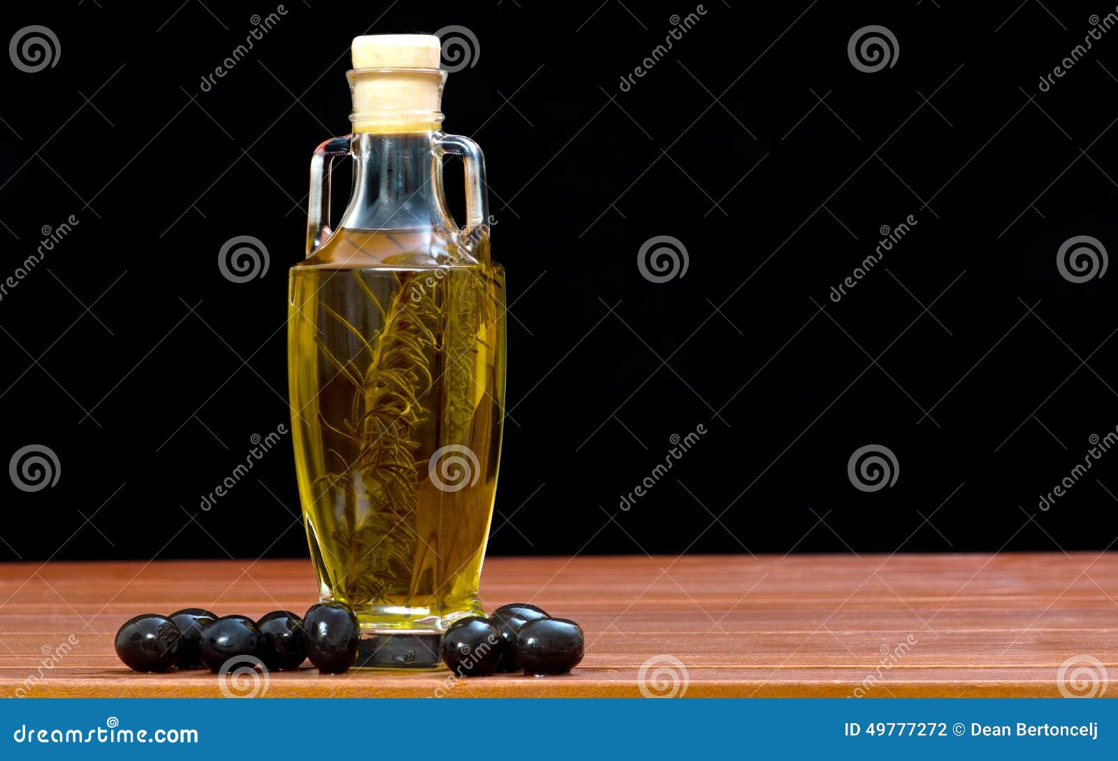 Olive oil on the table stock photo. Image of healthy - 49777272