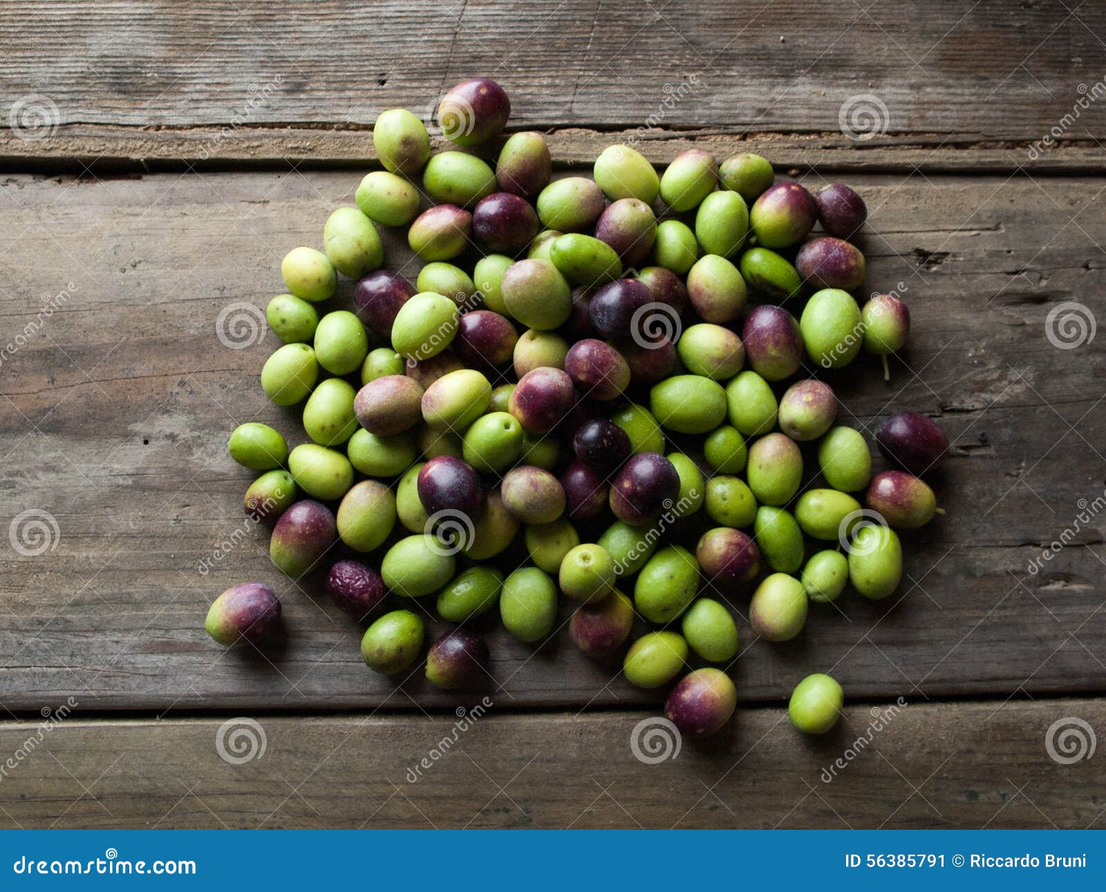 Olives on rustic table stock image. Image of carciofi - 56385791