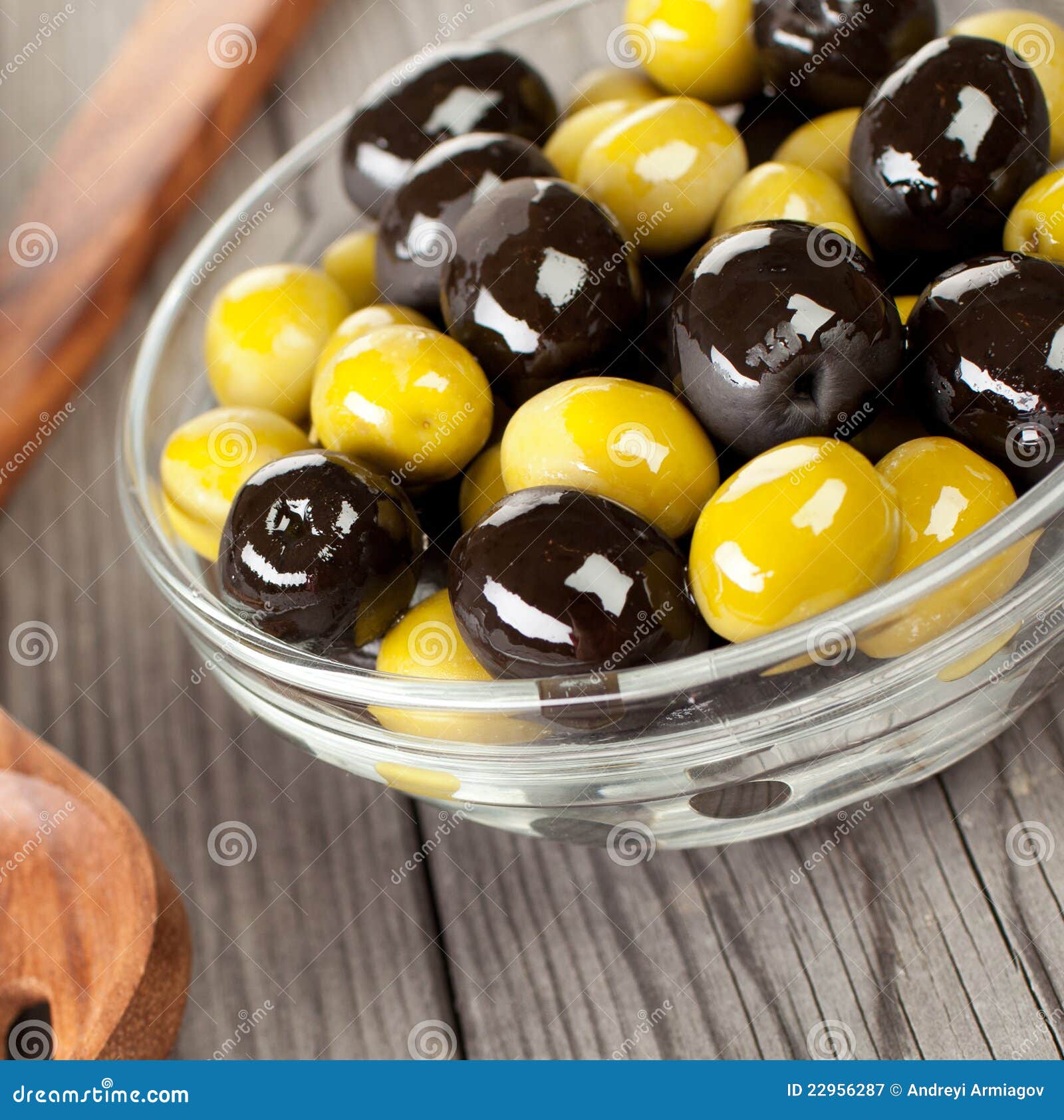 Olives on a wooden table stock image. Image of fruit - 22956287