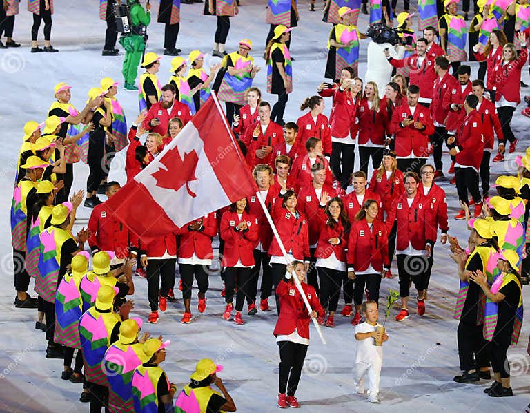 Olympic Champion Trampoline Gymnast Rosie MacLennan Carrying Canadian ... Olympic Champion Trampoline Gymnast Rosie MacLennan Carrying Canadian ...
