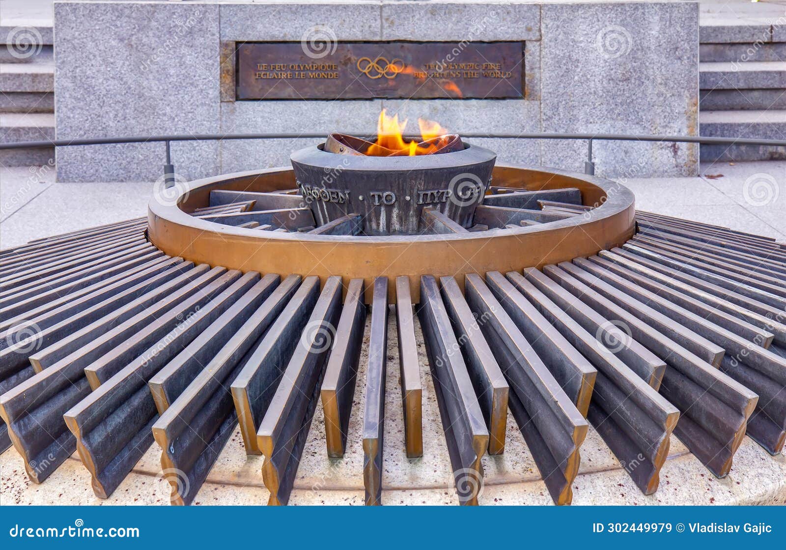 Flaming Olympic Torch In Front Of A Silhouette Of The Eiffel Tower In ...