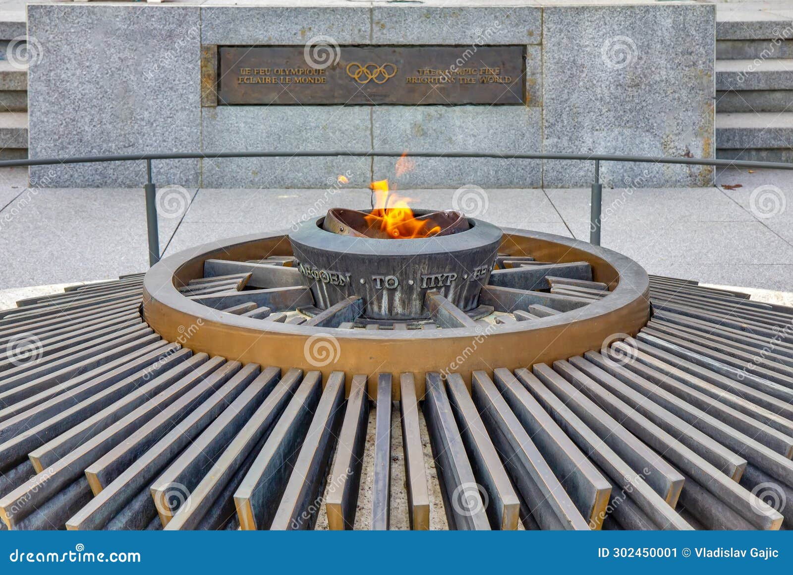 Flaming Olympic Torch In Front Of A Silhouette Of The Eiffel Tower In ...