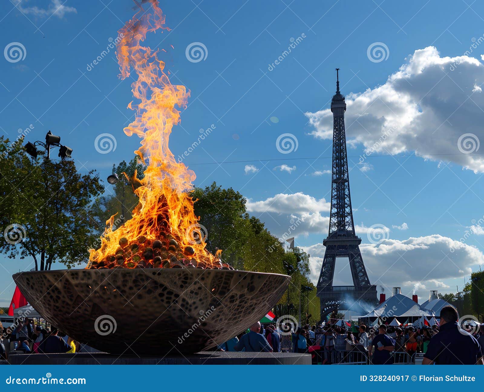 Olympic Flame with the Eiffel Tower in the Background Stock ...