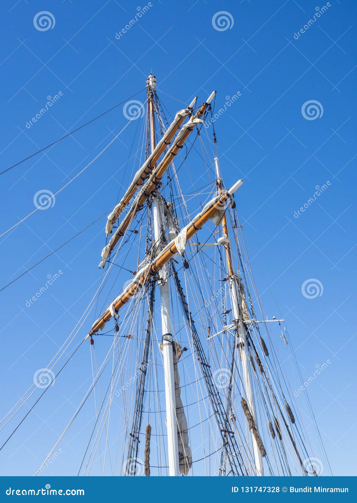 A Wooden Sailing Ship Pole Isolated on Blue Sky Background. Stock Photo ...