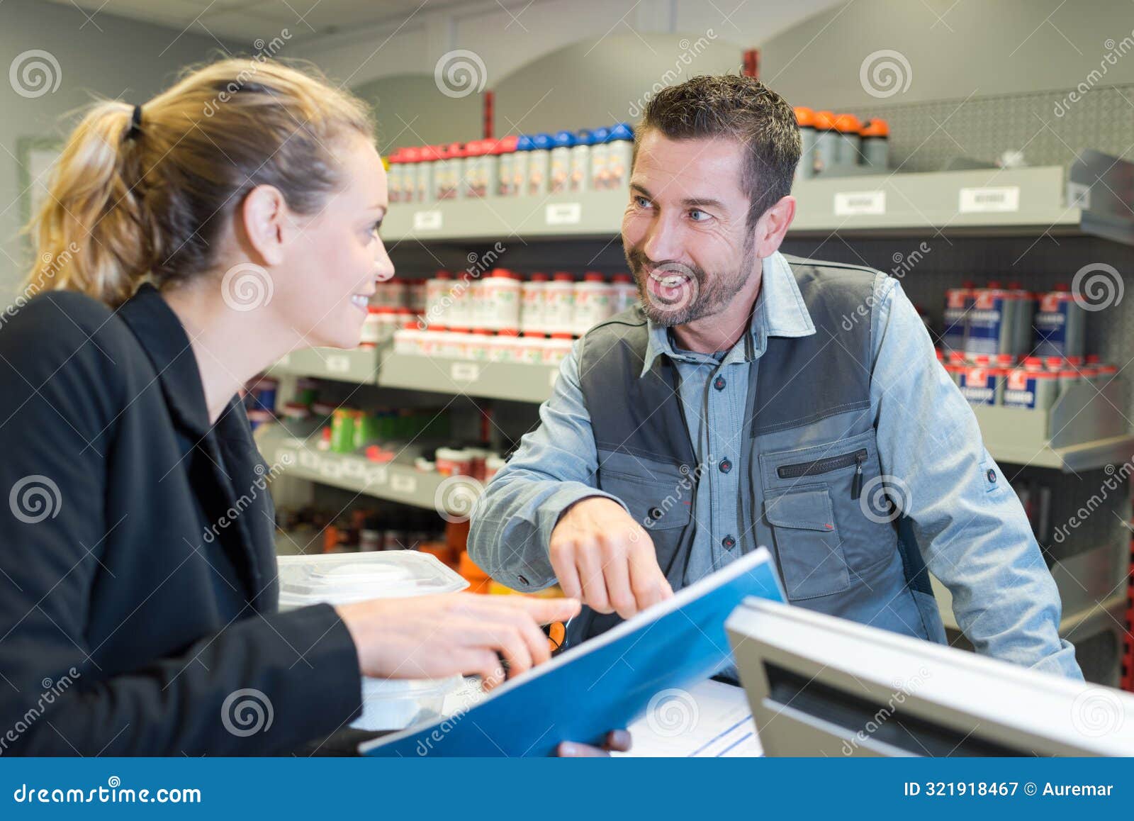 Oman and Man in Electrical Hardware Store Stock Image - Image of ...