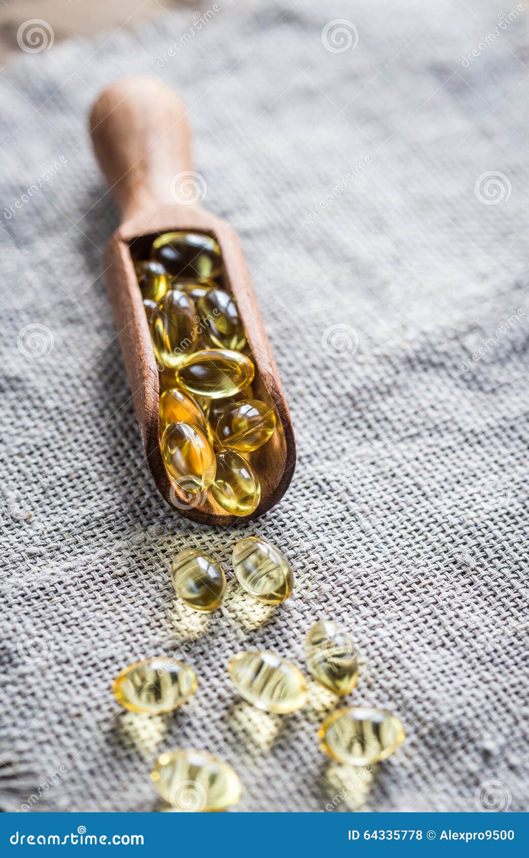 Omega-3 Capsules in the Wooden Scoop Stock Photo - Image of pile ...