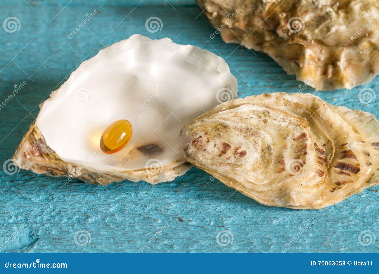 Omega 3 pill in oyster stock photo. Image of cook, alternative - 70063658