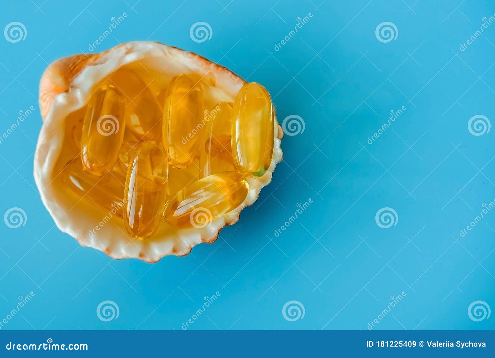 Omega 3 and Vitamin D Capsules on Shell, Fish Oil Pills . Stock Image ...