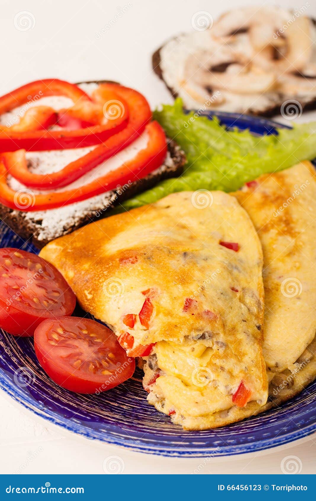 Omelet in a blue plate stock image. Image of bruschetta - 66456123