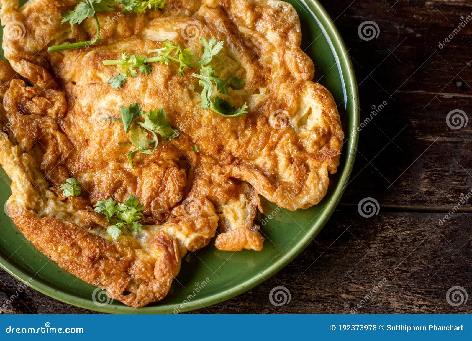 Omelet in a Plate on Wooden Table for Advertisement Stock Photo - Image ...
