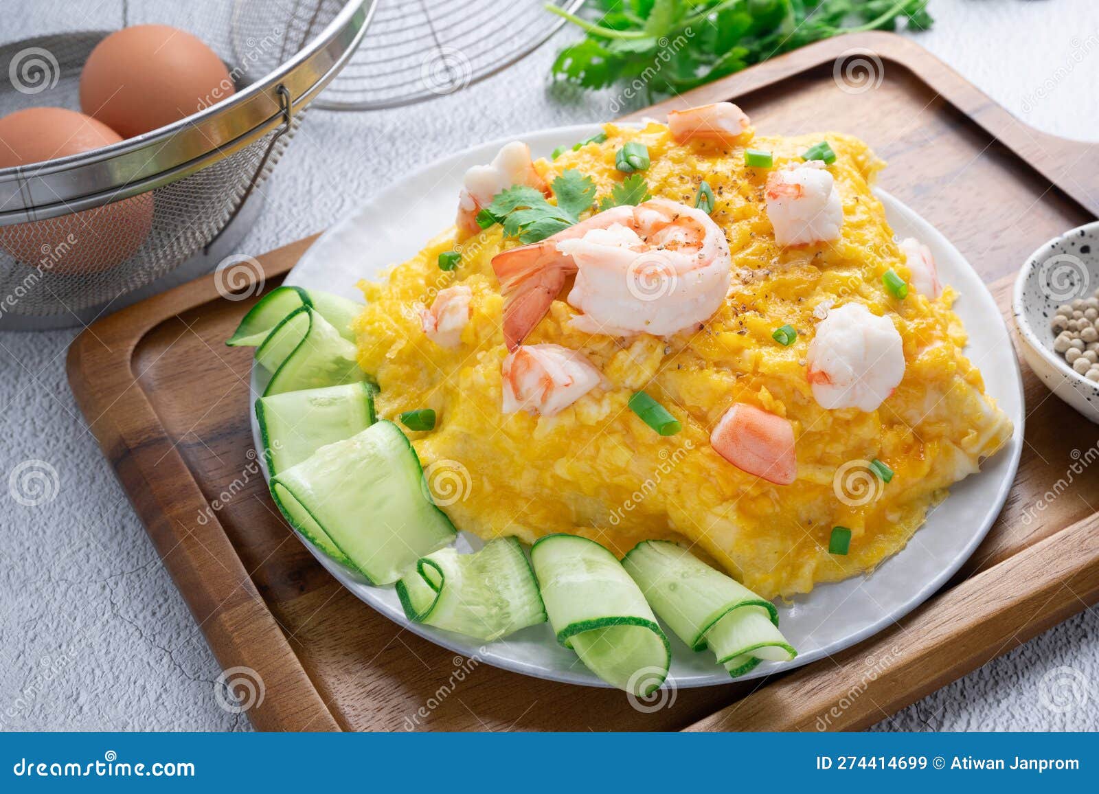 Omelet and Shrimp on Rice with Cucumber in Gray Dish on Concrete Table ...