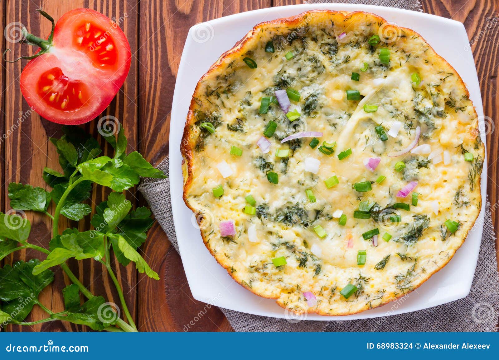 Omelet on a white plate stock photo. Image of omelet - 68983324