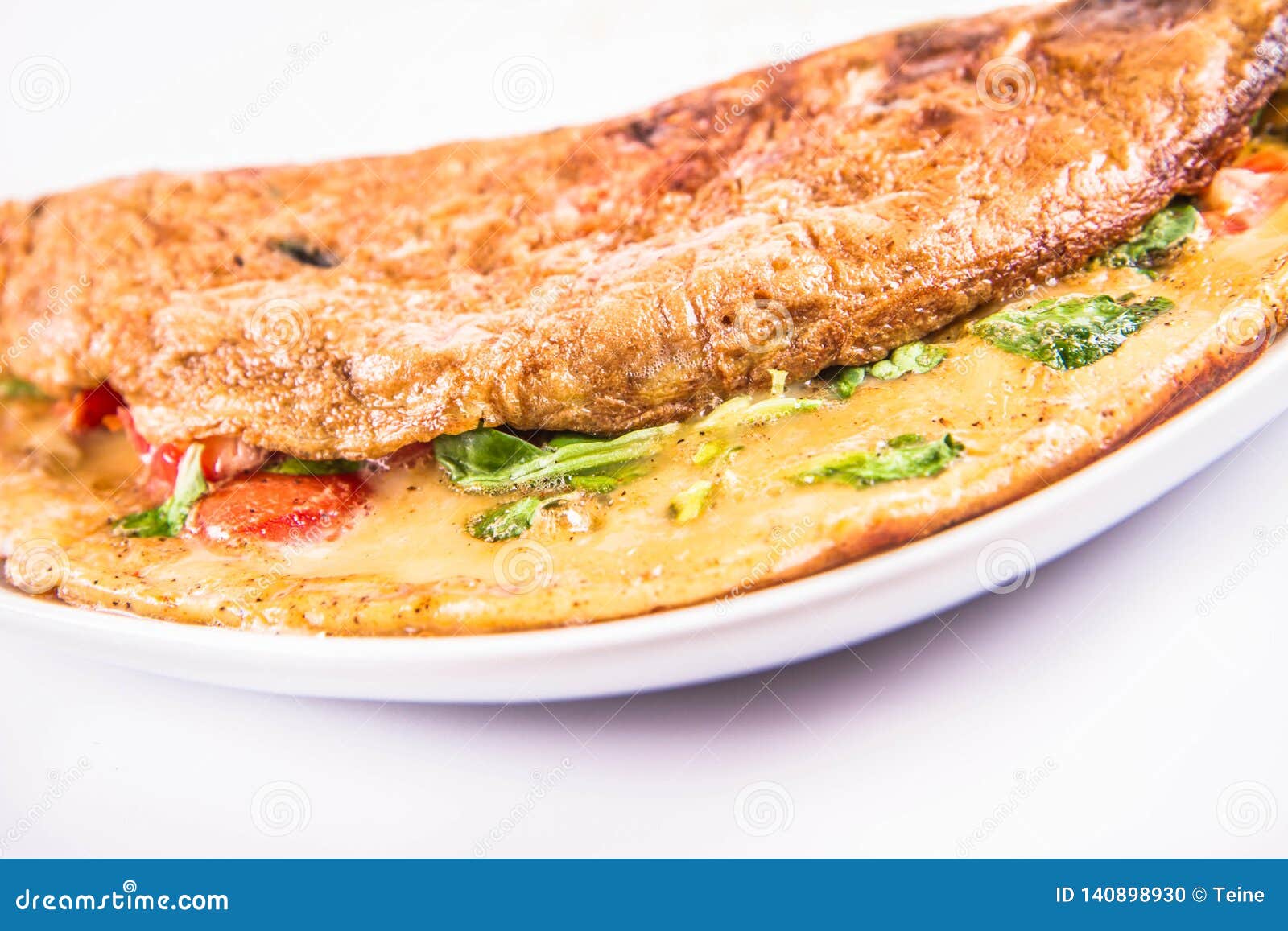 Omelette on a plate stock photo. Image of nutrition - 140898930