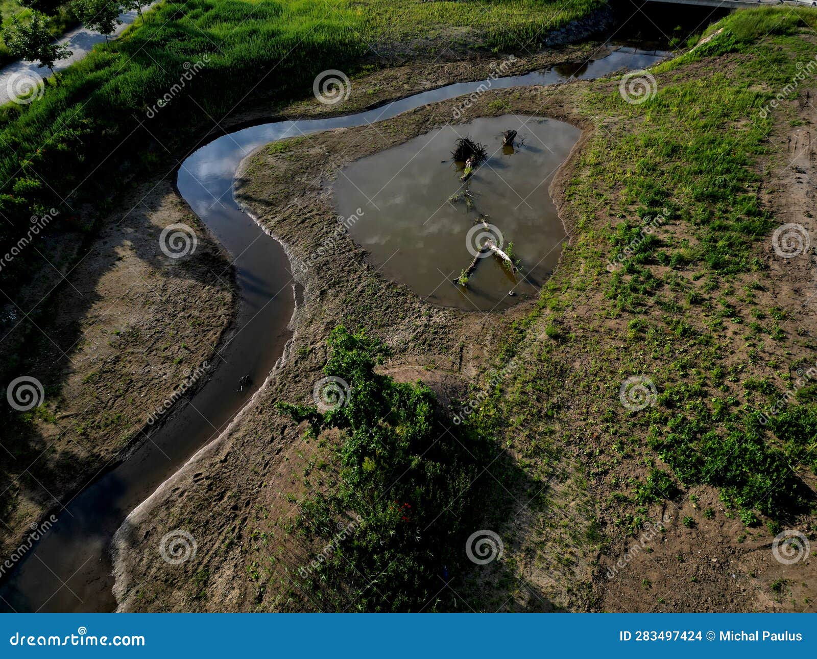 The Once Straightened Stream Bed is Reclaimed by Excavators into Stock ...