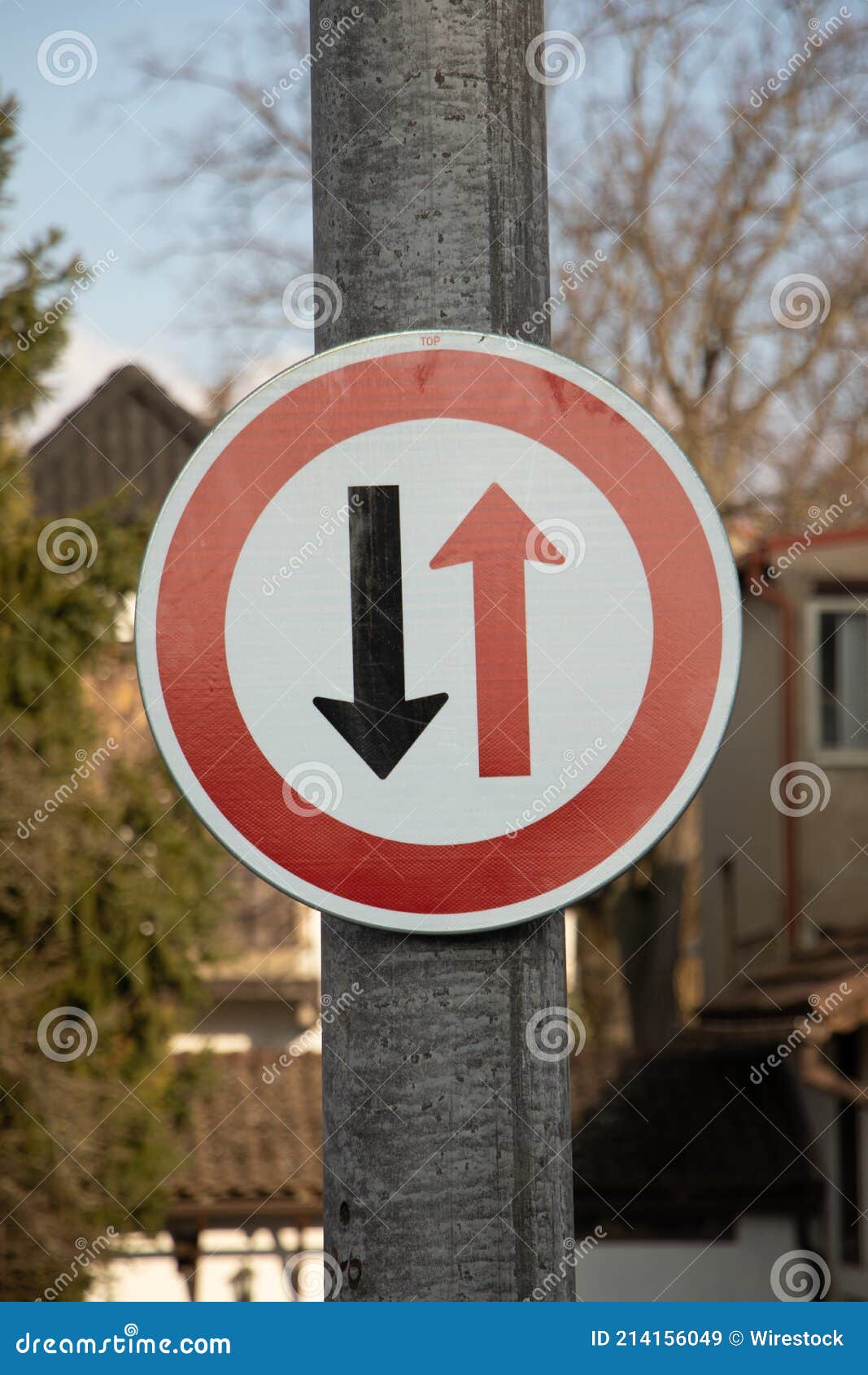 Oncoming Traffic Sign on a Post Int the St Stock Image - Image of ...
