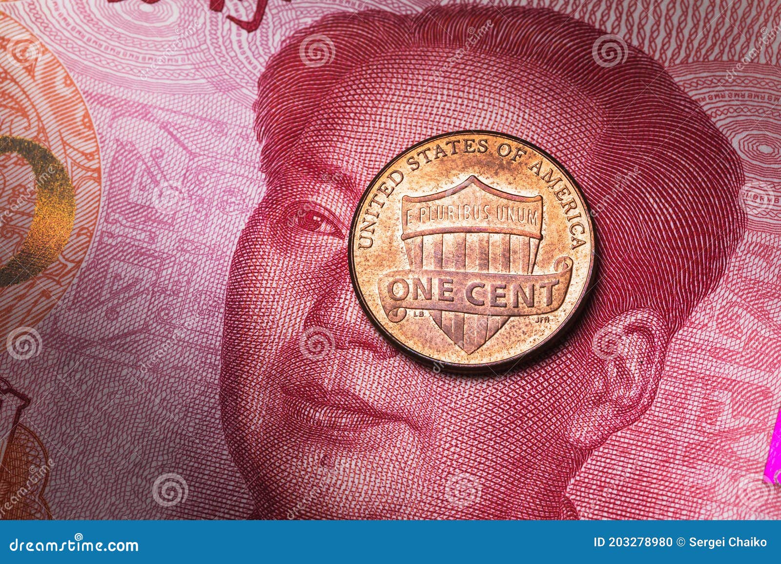 One American Cent Lying on the Background of a 100 Yuan Banknote Stock ...