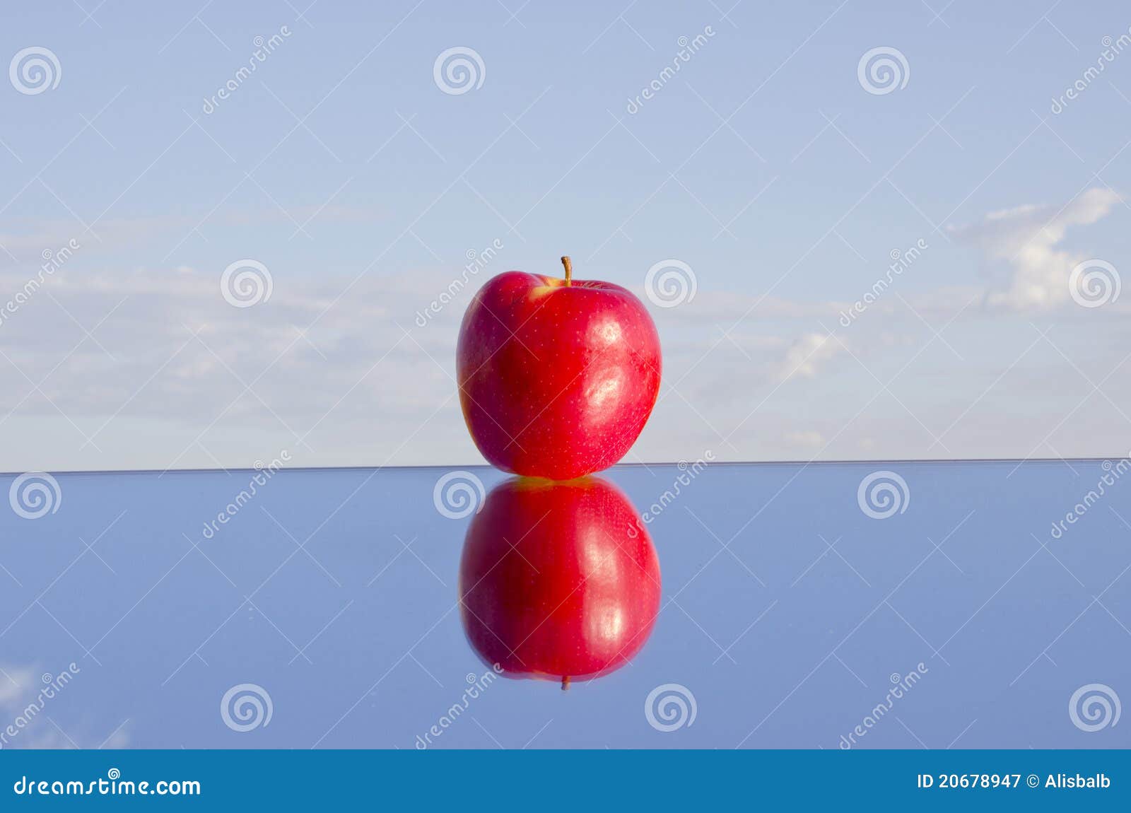 One Apple On Mirror And Sky Stock Image - Image of mirror, blue: 20678947