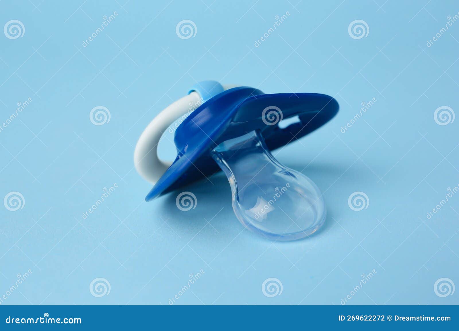 One Baby Pacifier on Light Blue Background Stock Photo - Image of mouth ...
