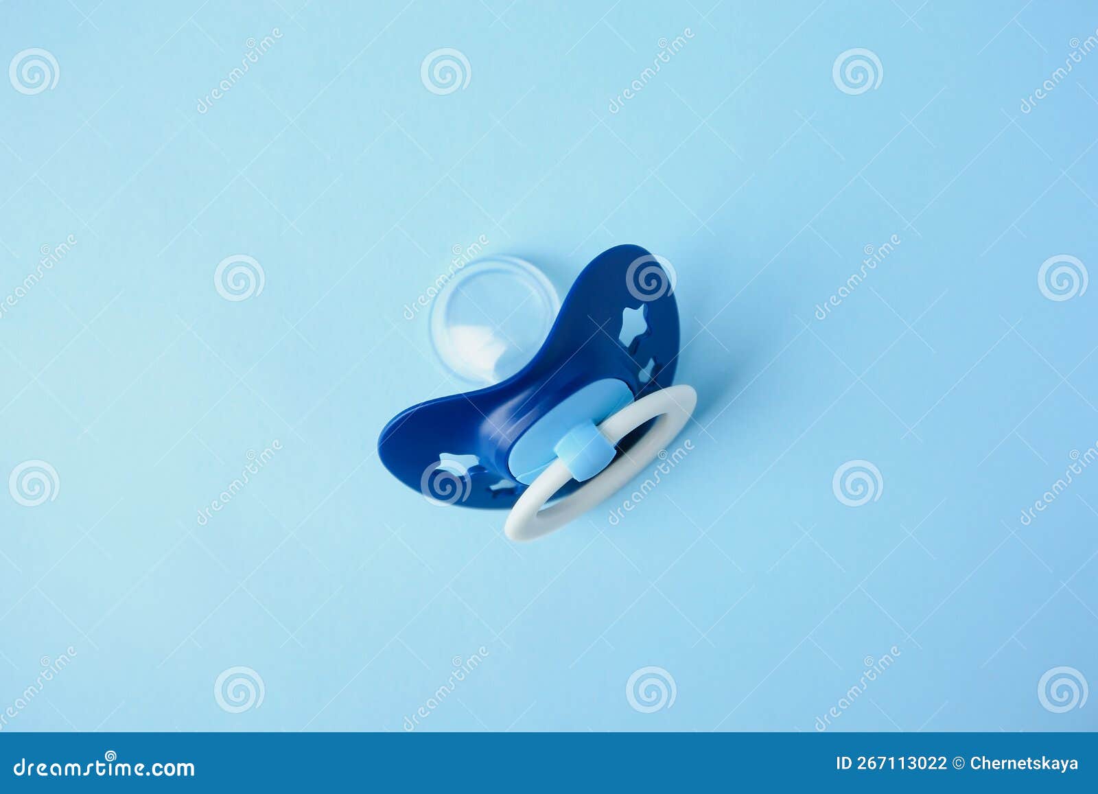 One Baby Pacifier on Light Blue Background, Top View Stock Photo ...