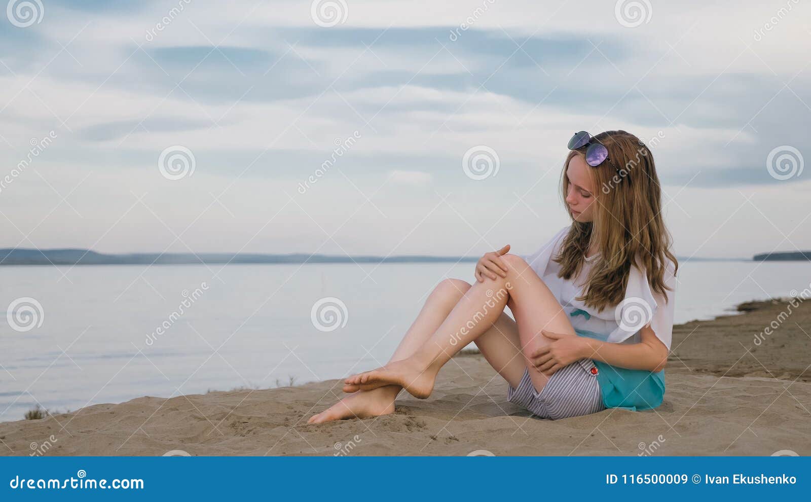 One Beautiful Teenage Girl With Brown Hair Outside On A Beautiful