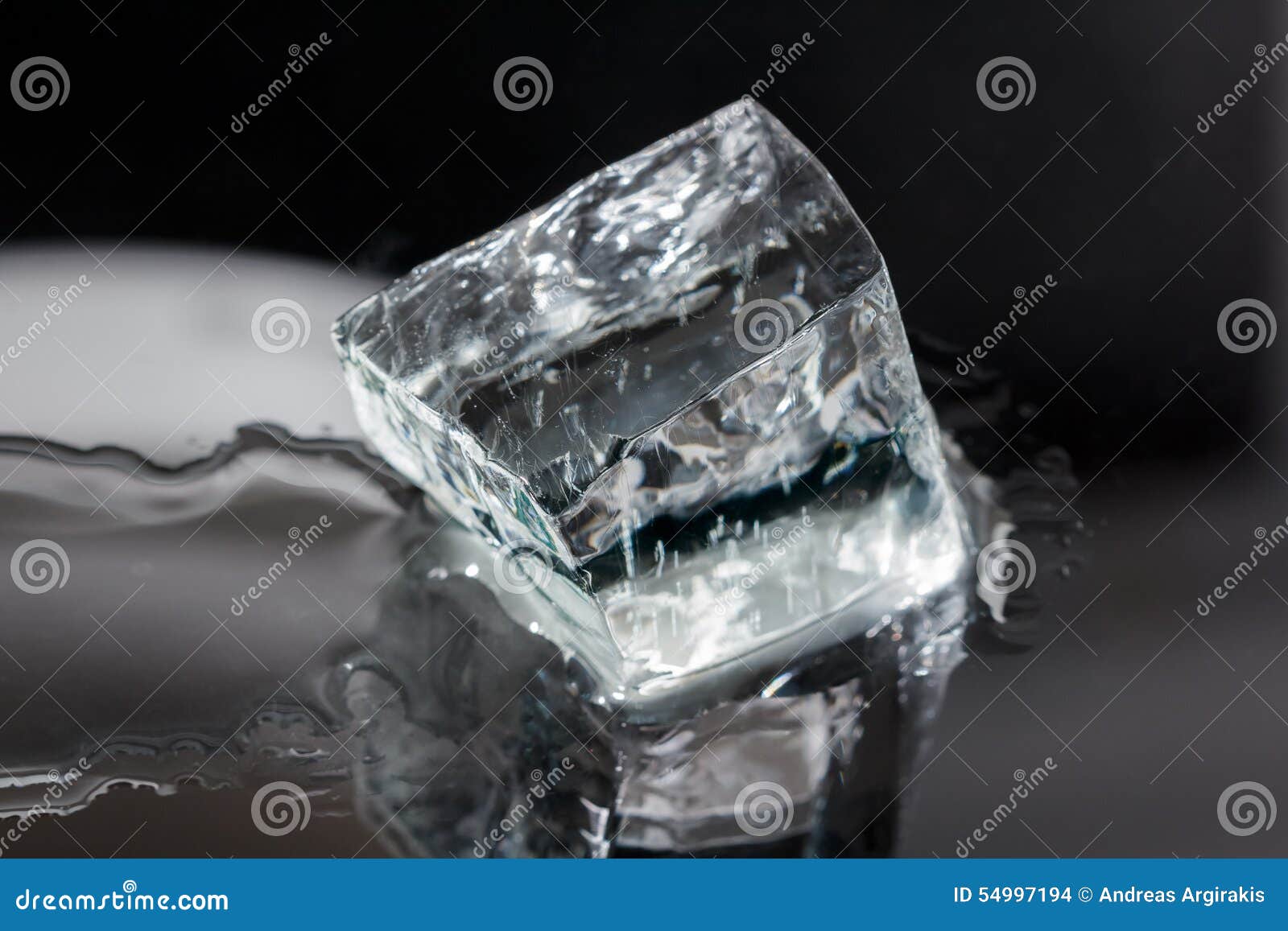 One Big Ice Cube Isolated on Black Stock Photo - Image of isolated ...