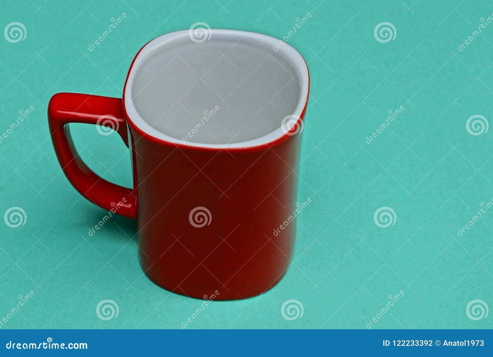 A Large Red Empty Cup is on a Green Table Stock Photo - Image of ...
