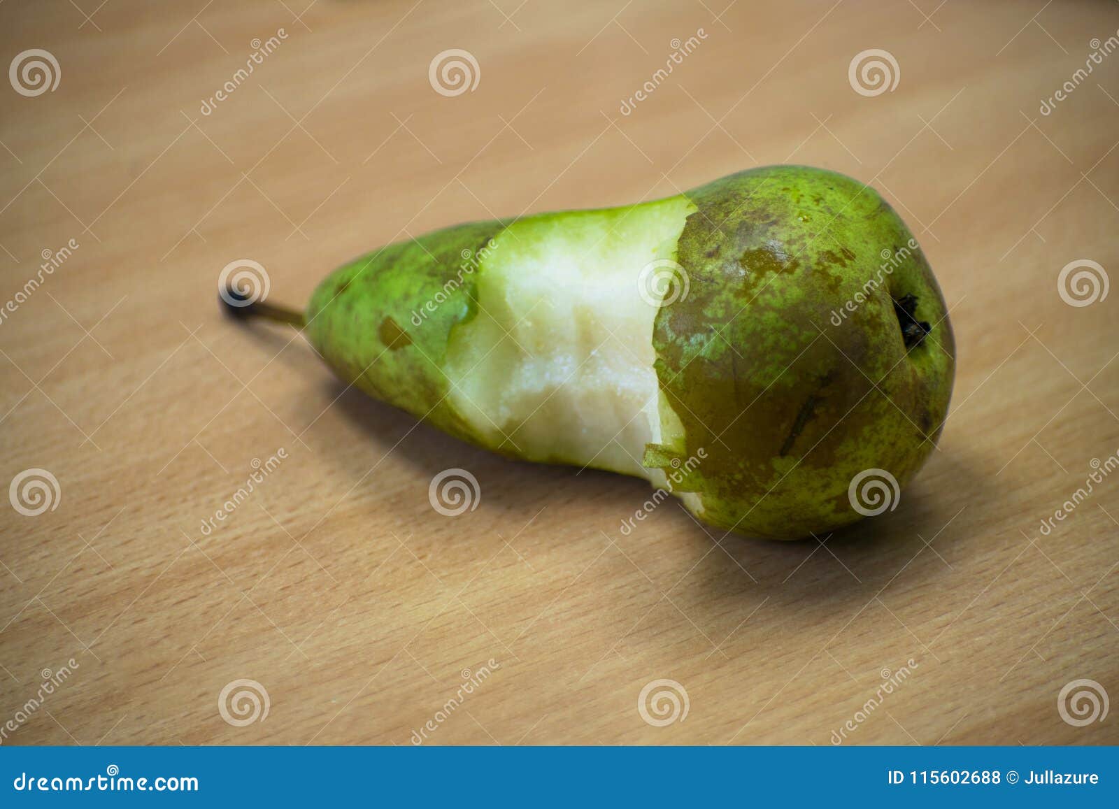 Bitten Pear Stock Photos - Royalty Free Pictures