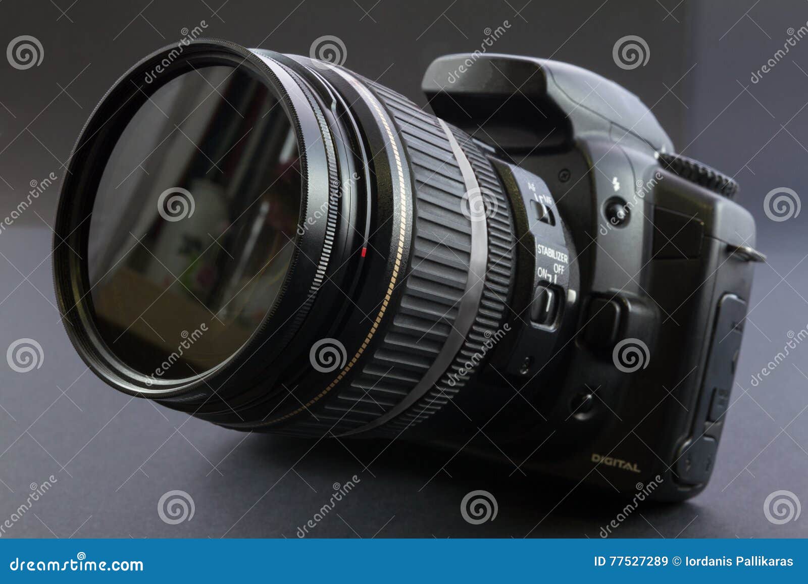 One Black DSLR Camera on Grey Background, Front Elevate Stock Image ...