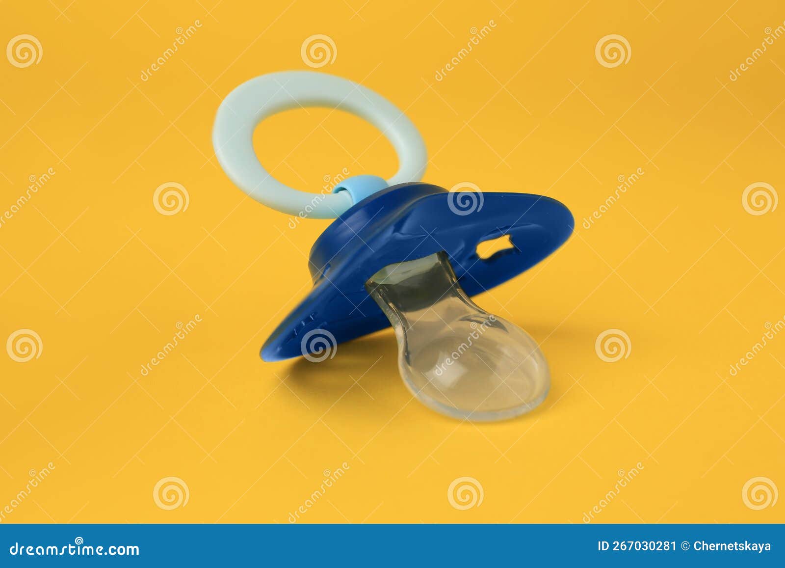 One Blue Baby Pacifier on Orange Background, Closeup Stock Image ...