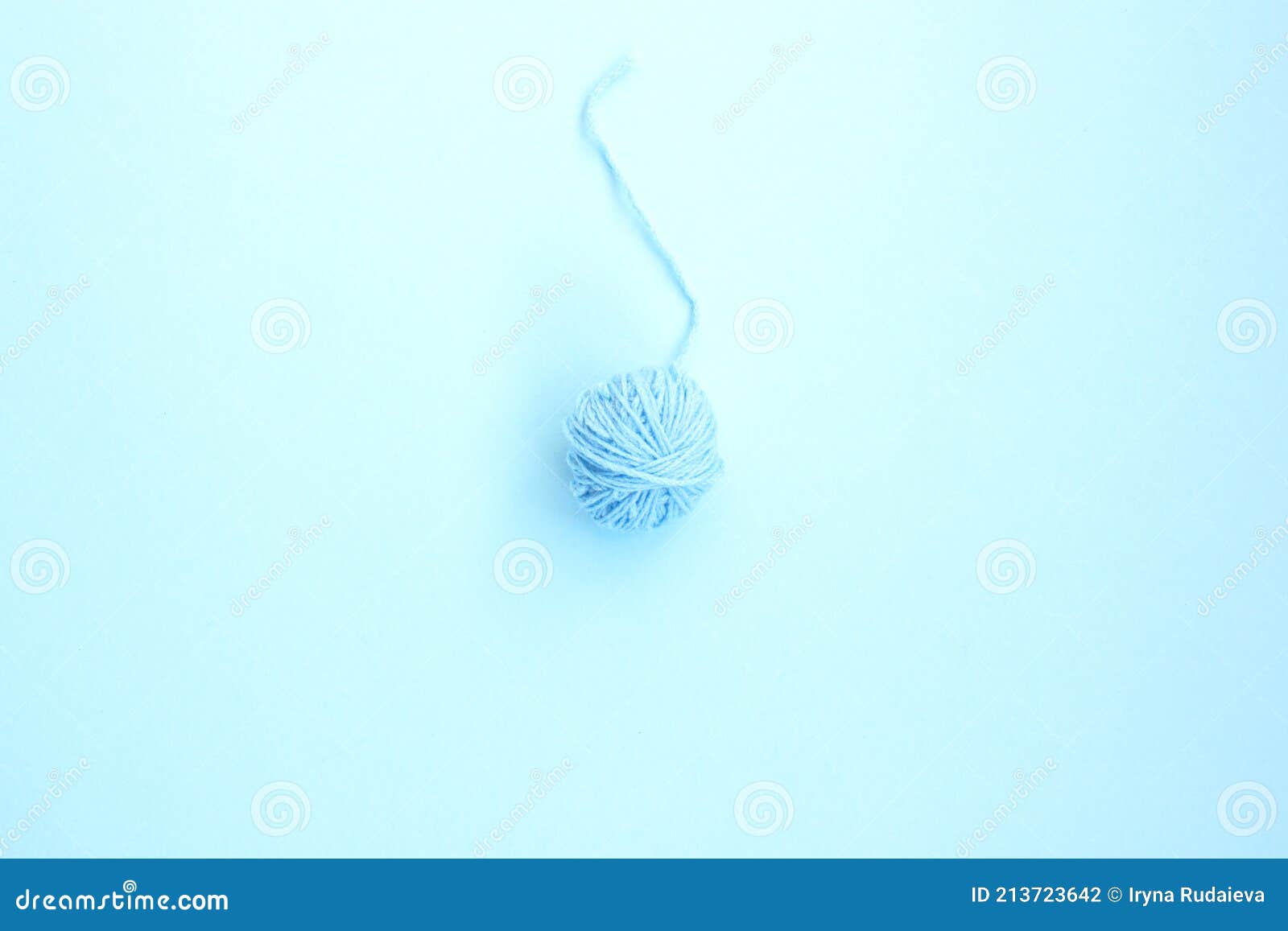 One Blue Ball of Woolen Thread on a Light Background Stock Photo ...