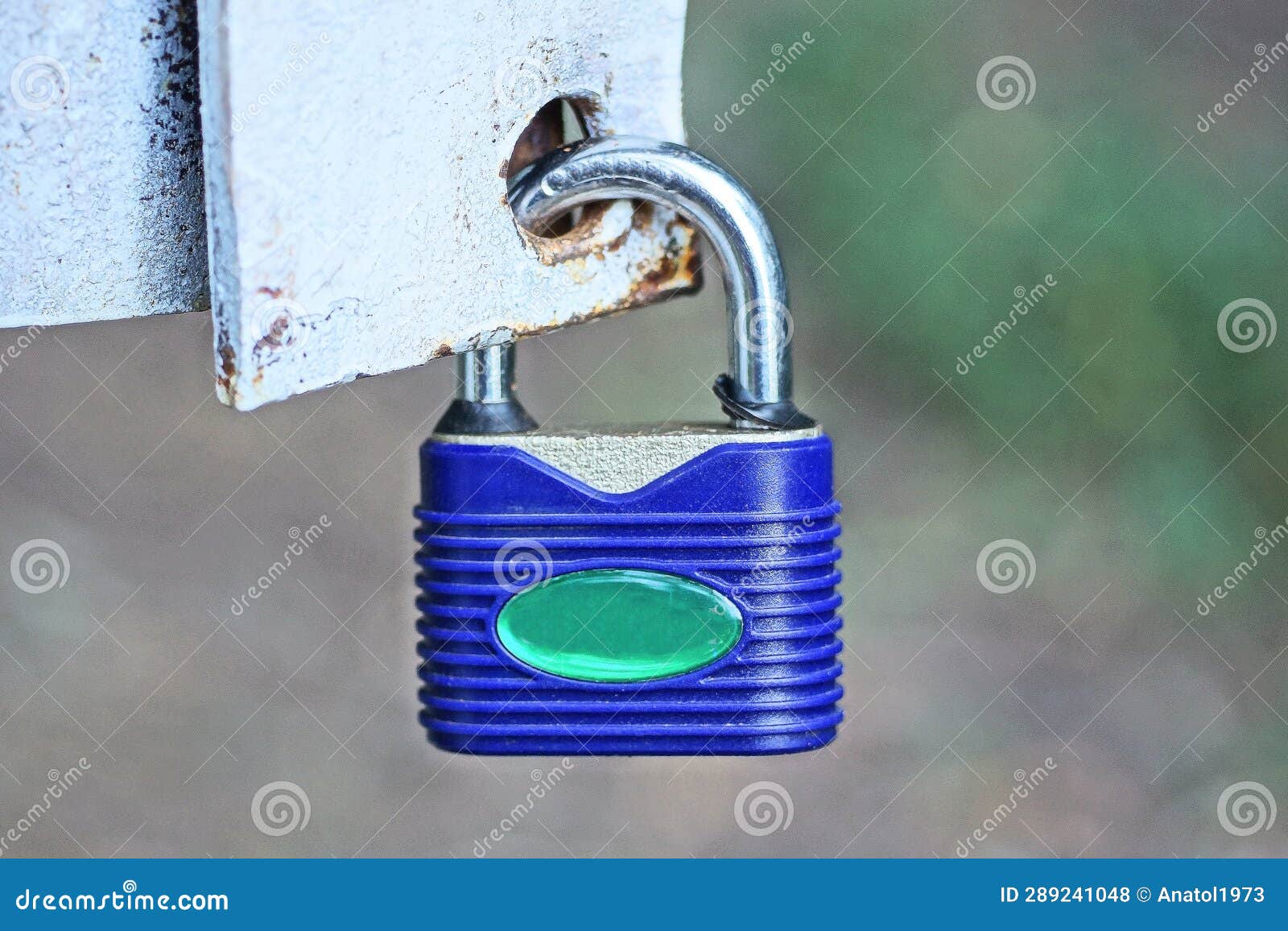 One Blue Green Padlock Hanging on a White Iron Loop on a Pole Stock ...