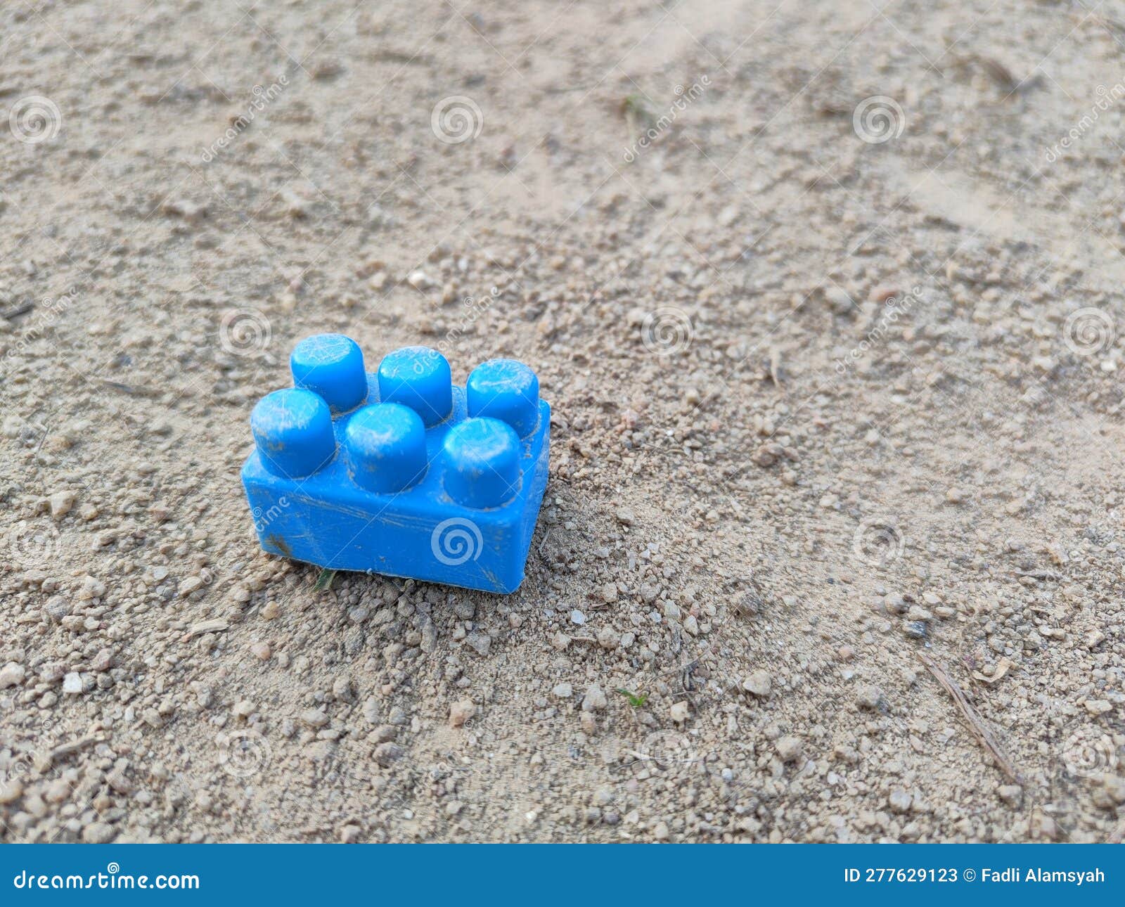 One Blue Lego on Sandy Ground Stock Image - Image of blue, ground ...