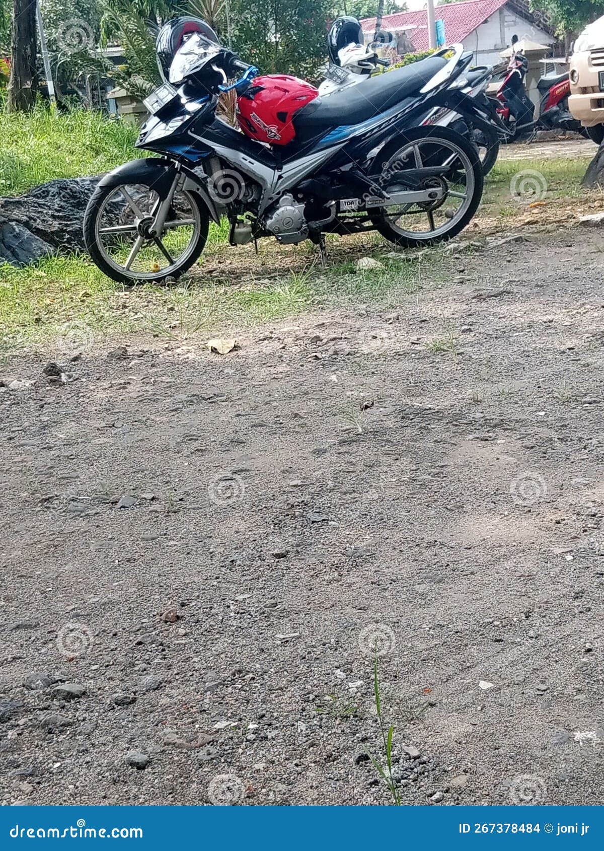 A MOTORCYCLE with a RED HELMET INSIDE Stock Photo - Image of motorcycle ...